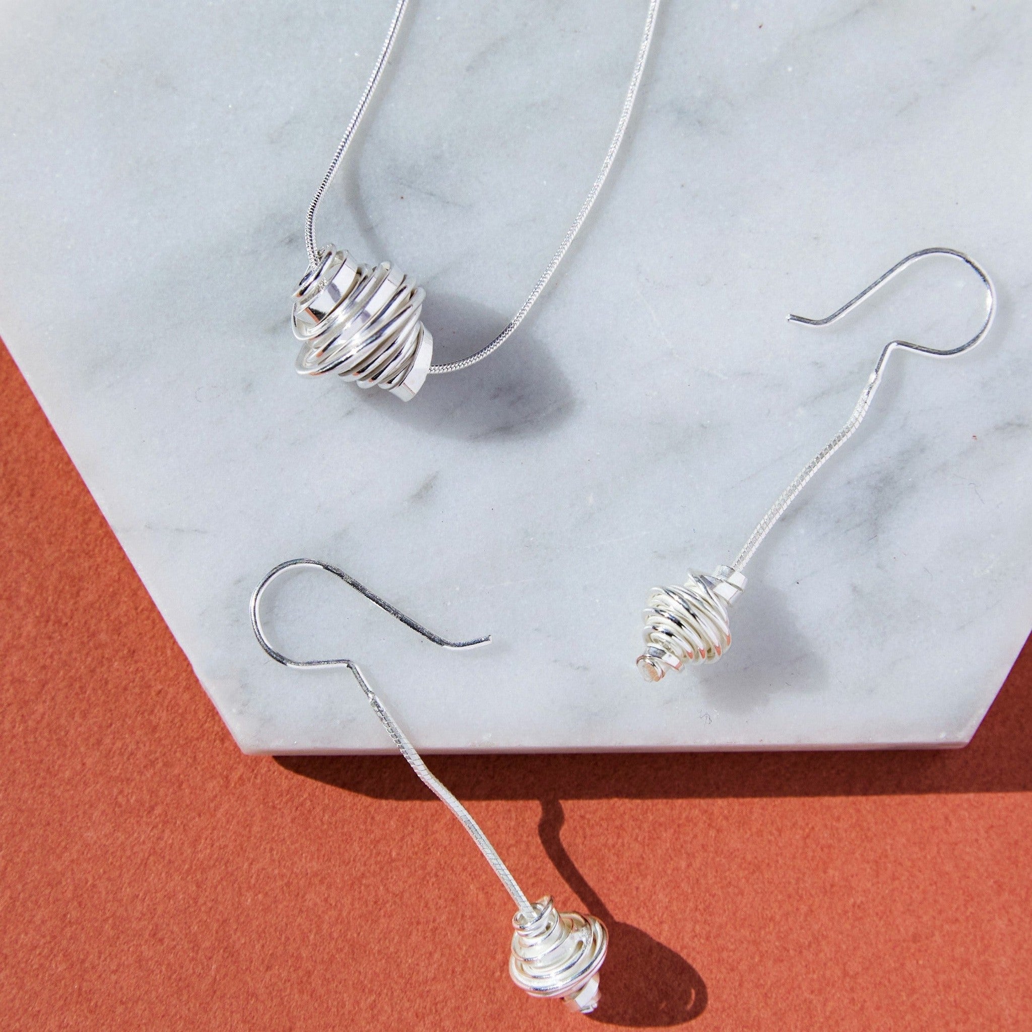 Sterling Silver Long Drop Coiled Charm Earrings – Otis Jaxon Silver ...